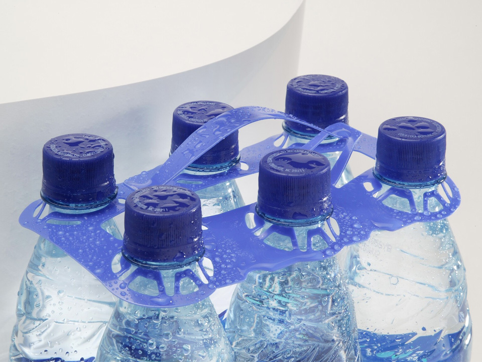 Bottle Handle Rings & Plastic Bottle Carrier Solutions - Poly Plastic ...